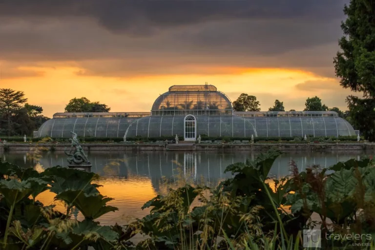 The glasshouse of London's Kew Royal Botanical Gardens at sunset
