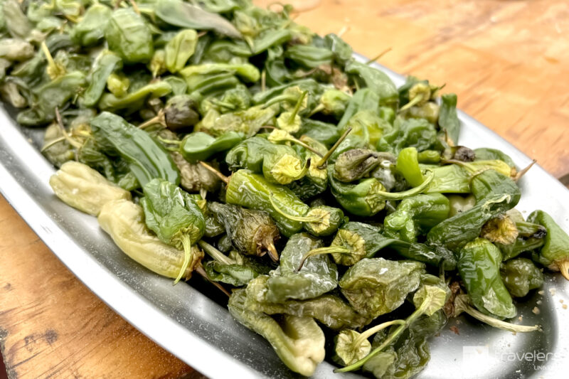 Spanish padrón peppers, a classical vegan tapas, on a platter
