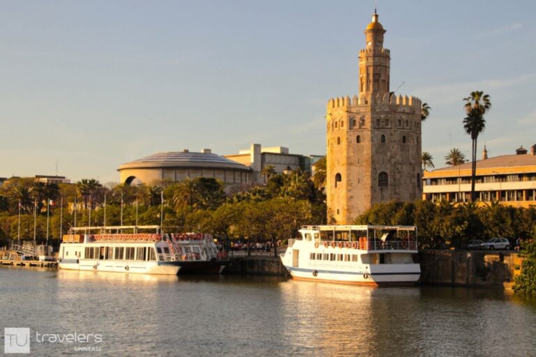 The Golden Tower with the Guadalquivir river and cruise ships
