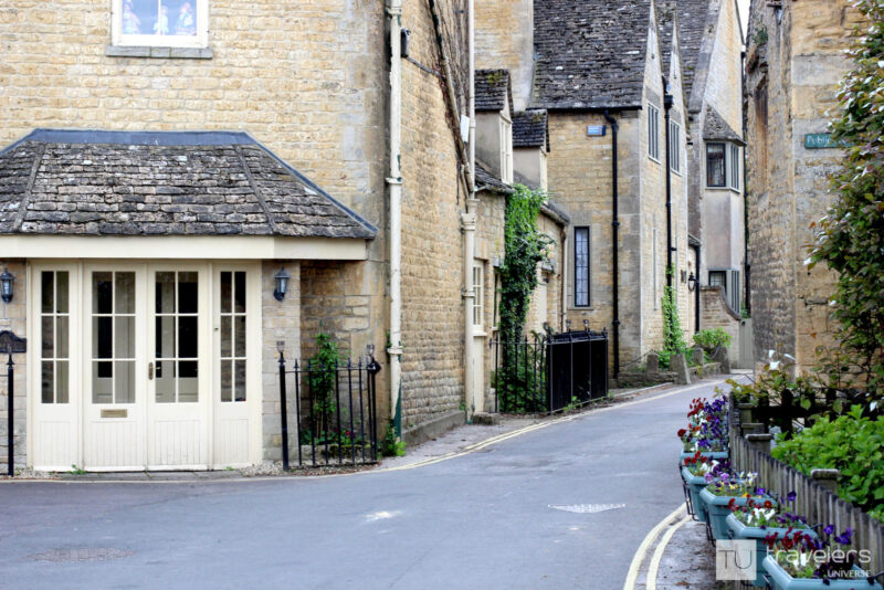 Street with pretty honey-colored houses in Bourton-on-the-Water