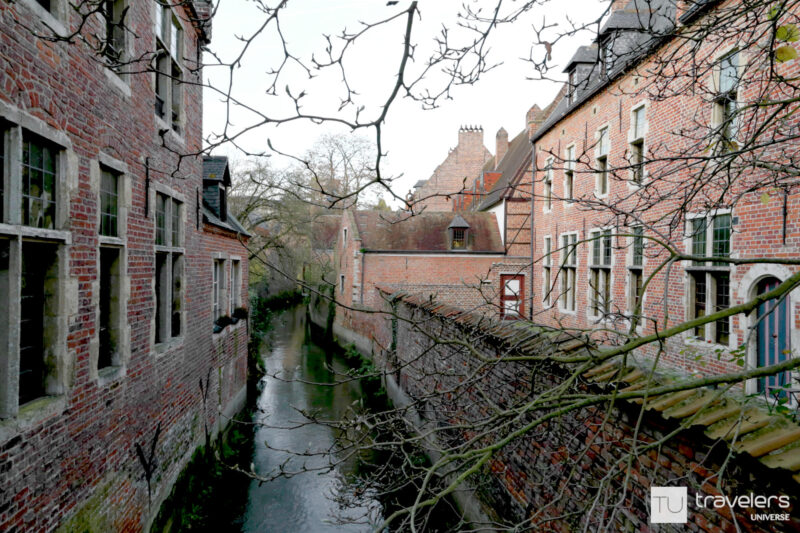 Red brick houses lining a canal in Grand Begijnhof in Leuven