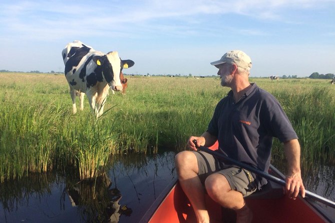 Small-Group Guided Sunset Canoe Tour in Waterland With Dinner - Exploring Waterlands Serene Landscapes