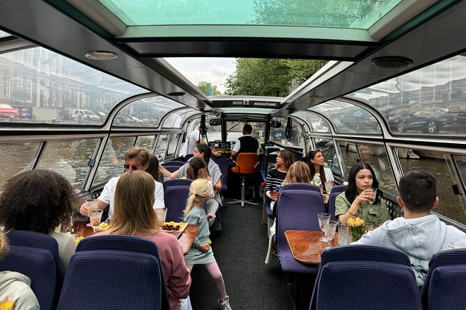 A Luxurious Cheese & Wine Canal Cruise Through Historic Amsterdam - Sipping on Refreshing Beverages