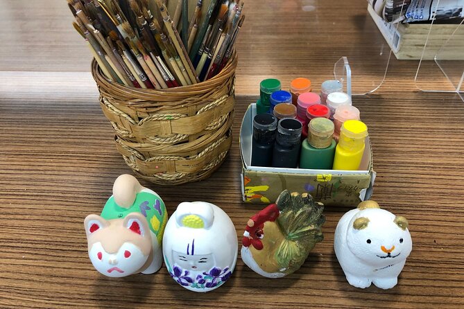 Fukuoka Open Top Bus and Hakata Doll Painting Experience With Guide - Itinerary Details