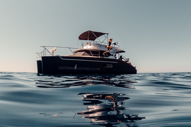Private Caldera Cruise With Power Catamaran ENJOY Incl. Meal & Drinks - Meeting and Pickup