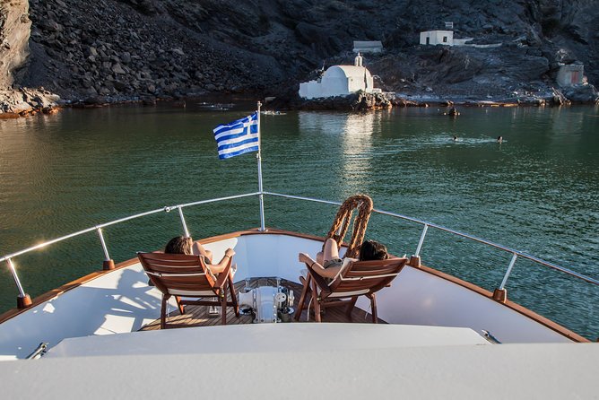 Santorini: Motor Yacht Sunset Cruise With 5-Course Dinner - Inclusions and Amenities