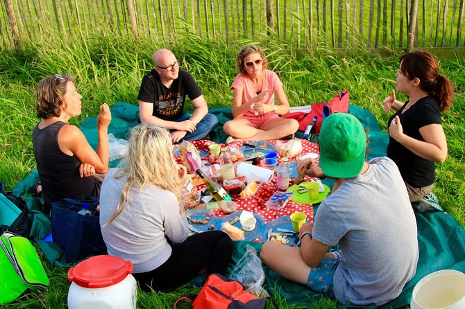 Small-Group Guided Sunset Canoe Tour in Waterland With Dinner - Reclaiming the Land From the Sea