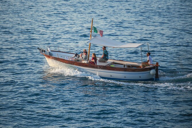 Sorrento Coast Cruise in Typical Gozzo With Limoncello Tasting - Exploring the Sorrento Coastline