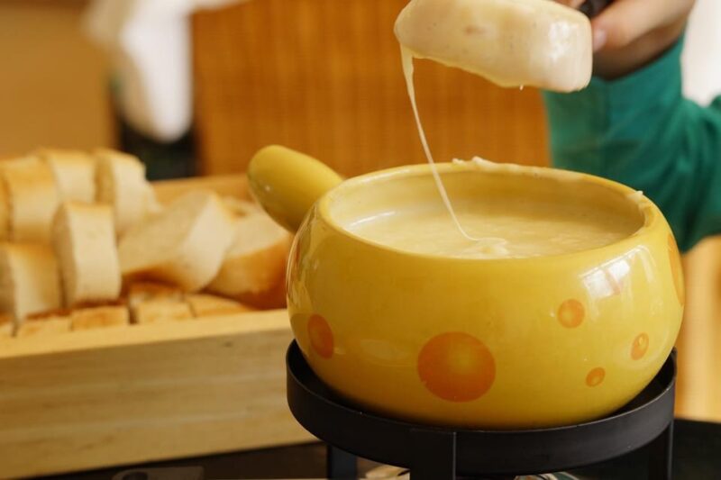 Basel: Cheese Fondue, Wine and Dessert Culinary Experience - Setting and Atmosphere