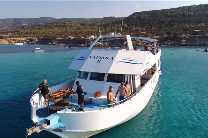 Blue Lagoon Sunset СRuise With BBQ & Water Slide From Paphos - Dining Experience: BBQ Dinner and Local Wines