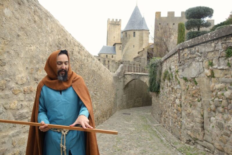 Carcassonne: Medieval Builder-Themed City Tour With a Guide - Discover the Landmarks: Narbonne Gate, Comtal Castle, and Basilica