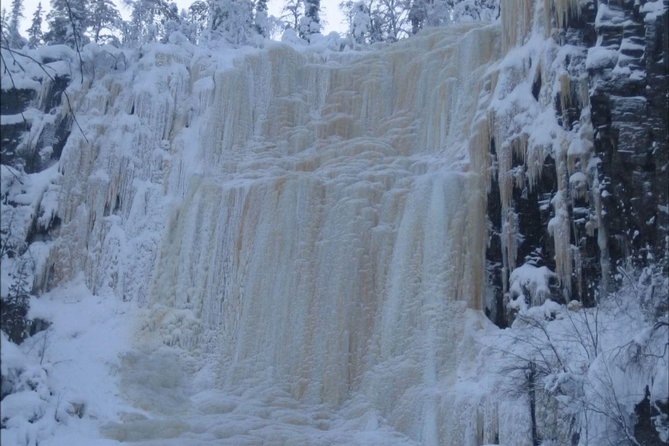Korouoma National Park & Frozen Waterfalls Adventure - Warming Up by the Campfire