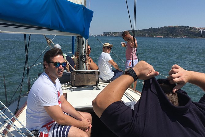 Lisbon Sailing Day Cruise With Wine & Snacks - Savoring the Flavors: Wine and Snacks on Board