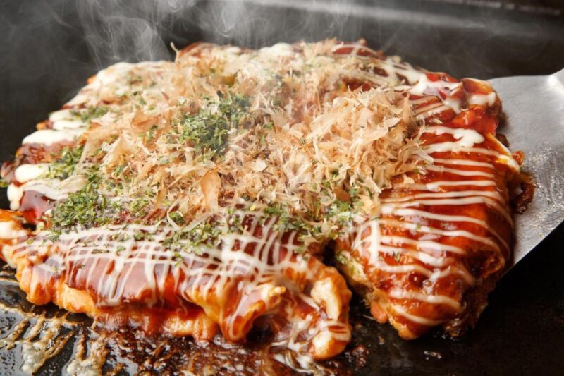 Osaka: Local Foodie Tour in Dotonbori and Shinsekai - Savoring the Local Delicacies