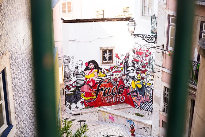 Private Tour: Lisbon Sunset Walking Tour With Fado Show and Dinner - Savoring a Delectable Portuguese Dinner