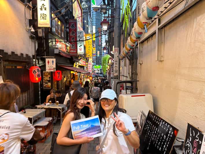 Tokyo Shinjuku: Discover Night Culture & Japanese Gourmet - Kabukicho: Exploring the Bright Lights and Lively Atmosphere
