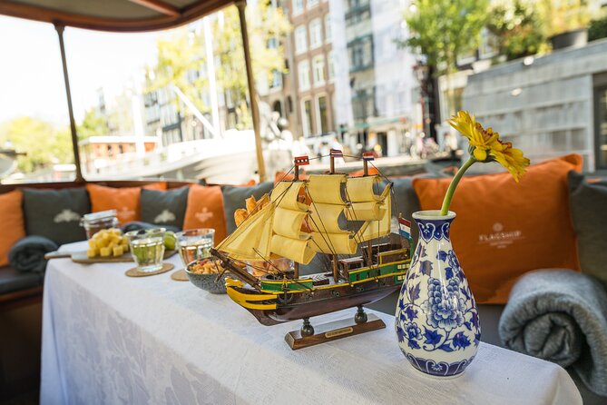 Amsterdam Canal Cruise With Cheese and Wine Review - Navigating the Experience