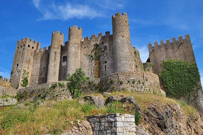 Excursion From Lisbon to Fátima Grutas Nazaré and Óbidos - Discovering Nazaré