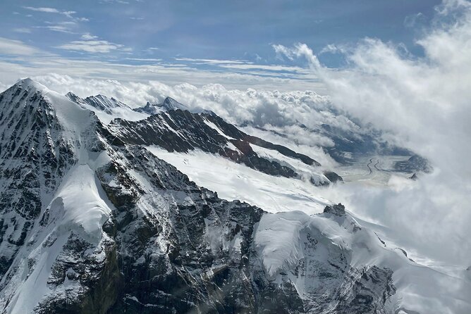 Private Swiss Alps Helicopter Tour Over Snow Covered Mountain Peaks and Glaciers - Meeting Point and Logistics