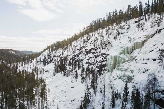 Rovaniemi - Visit to The Frozen Waterfalls of Korouoma - Delicious BBQ Lunch and Campfire Snacks