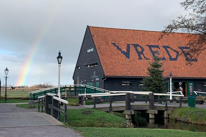 Visit Amsterdam Countryside With Windmills by Bike - Visiting a Traditional Cheese Farm