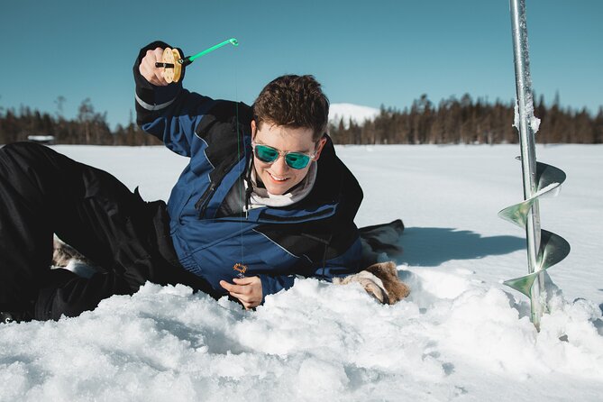 Lappish Lunch Break -Snowmobiling, Ice Fishing and Tasty Food - Positive Customer Experiences