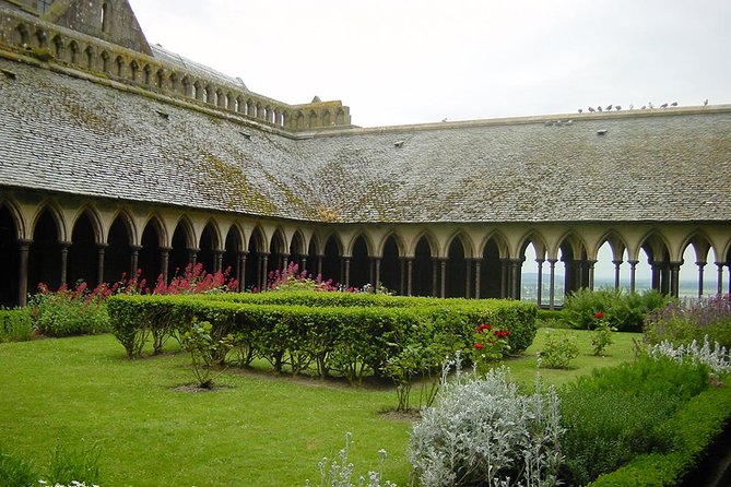 Mont St Michel Guided Day Trip From Paris in Minivan - Exploring the Medieval Abbey