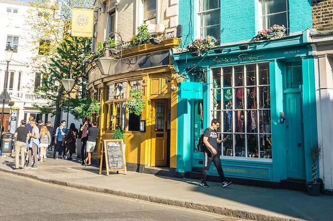 Notting Hill Walking Tour With Cream Tea - Hearing Tales of Notting Hills Fascinating History
