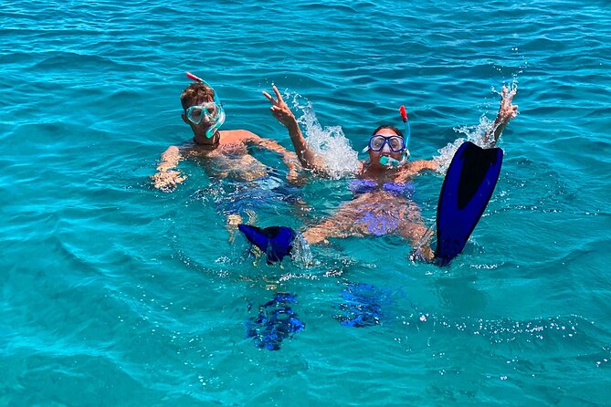 Rethymno: Sunset Catamaran Cruise With Wine and Snacks - Catamaran Amenities and Activities