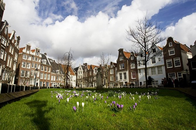 Secrets of Amsterdam Walking Tour Plus Dutch Sweets Tasting - Savoring Dutch Treats at the Flower Market