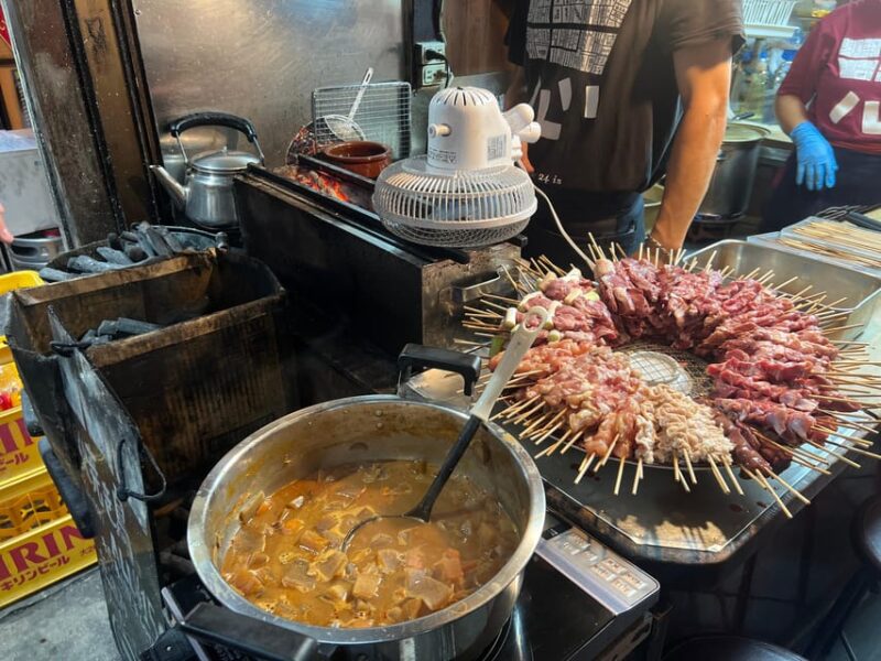 Tokyo: Shinjuku Food Tour (13 Dishes and 4 Eateries) - Sashimi and Japanese Sake