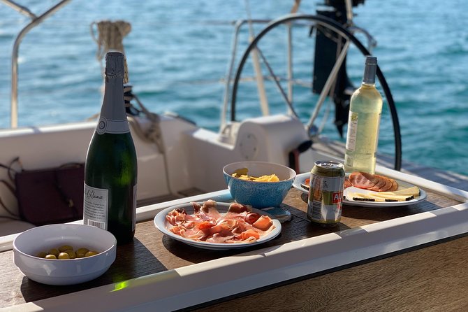 Barcelona Sunset Private Sailing With Light Snacks and Open Bar - Crew Professionalism and Hospitality