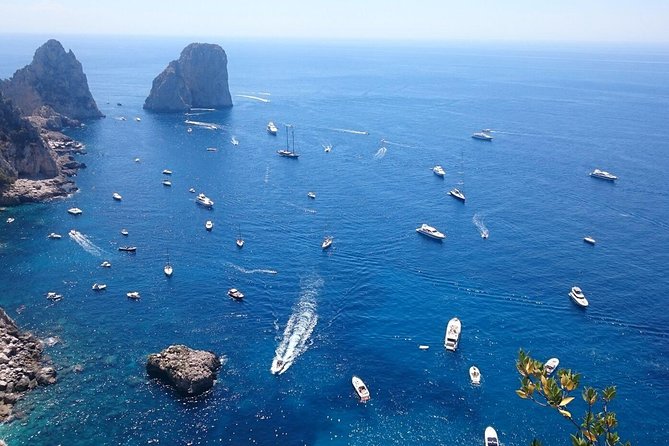 Capri Guided Day Trip From Rome: Ferry & Blue Grotto - The Captivating Blue Grotto