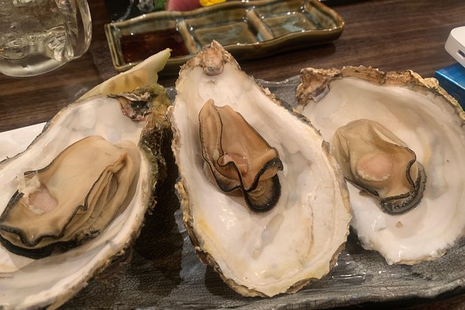 Hiroshima Bar Hopping Food Tour - Engaging in Conversations and Learning