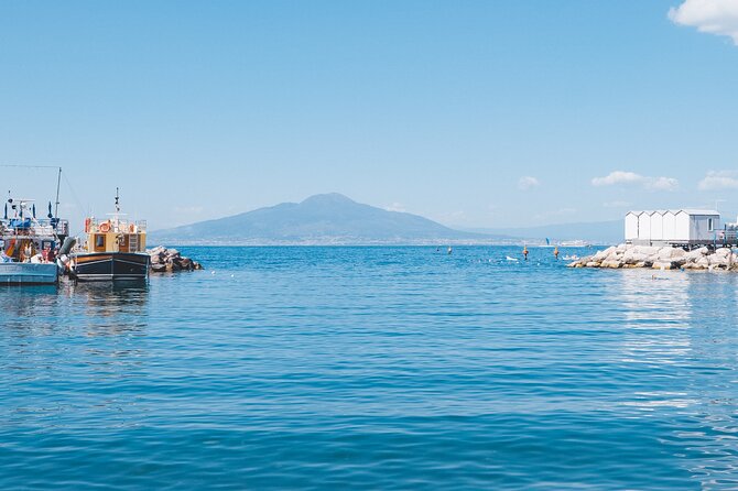 Sorrento Coast Cruise in Typical Gozzo With Limoncello Tasting - Knowledgeable Skippers Commentary
