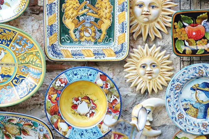 Capri Guided Day Trip From Rome: Ferry & Blue Grotto - Discovering Capris Piazzetta and Boutiques