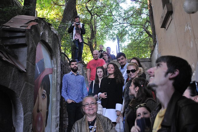 Private Walking Tour: Essential Bucharest + Hidden Gems - Discovering Revolution Square and Its Significance