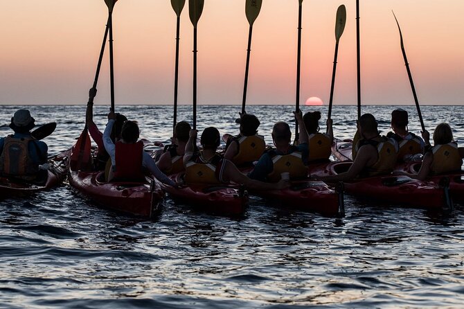 Santorini: Sunset Sea Kayak With Light Dinner - Enjoying the Local Fare