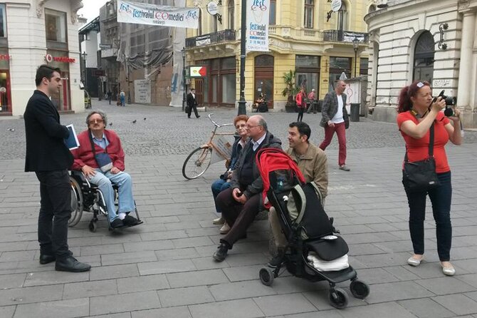 Bucharest: Communism, Revolution & City Highlights Tour - Visiting Revolution Square and Monuments