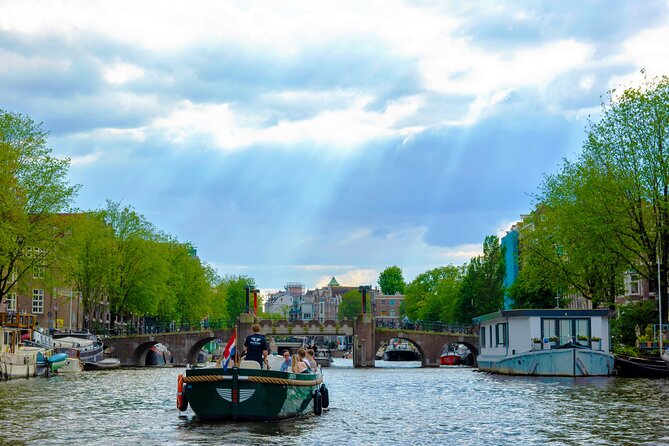 Amsterdam: the Newest Canal Cruise Optional Dutch Snack and Drink - Key Points