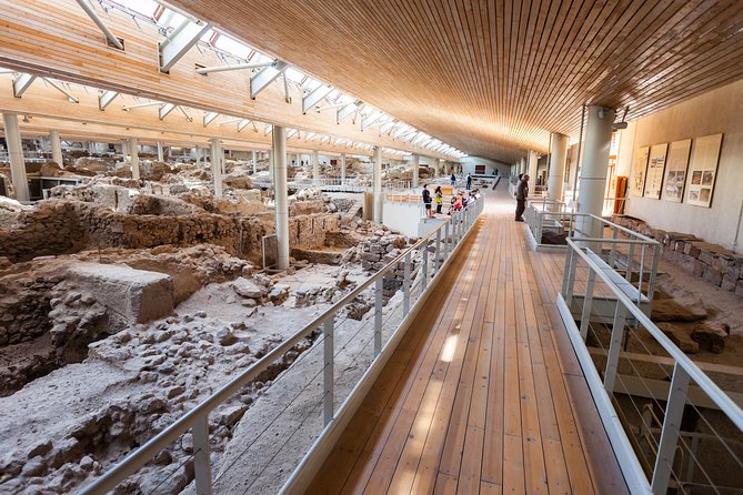 Archaeological Bus Tour to Akrotiri Excavations & Red Beach - Tour Logistics and Inclusions
