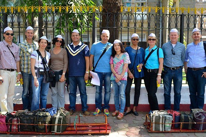 Dabbawala, Dhobi Ghat & Dharavi slum Tour with Local Train Ride - FAQ