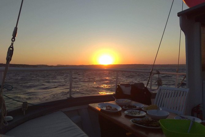 Sunset Cruise With a Swimming Stop at Kalithea Bay - Meeting Point and Pickup