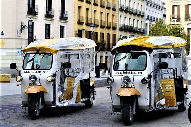 Tour of Historic and Modern Madrid With a Guide in a Yellow Tuk Tuk - Highlights of Madrids Rich History