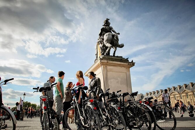 Paris Along the Seine: Guided Tour of the Greatest Monuments - Cycling Past the Louvre Museum and Its Wonders