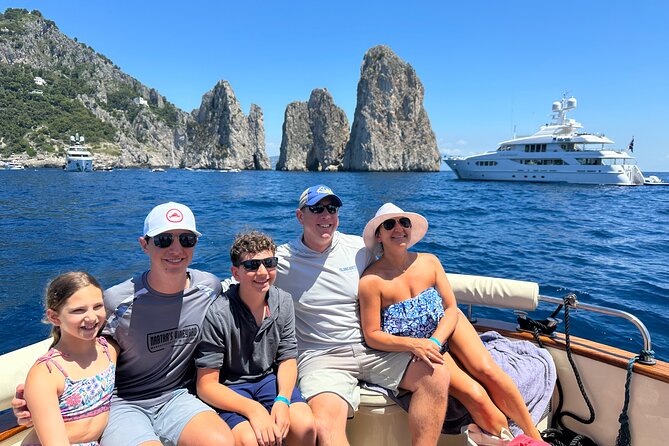 Private Boat Tour to Capri and Blue Grotto on Gozzo 32 Ft - Onboard Amenities and Inclusions