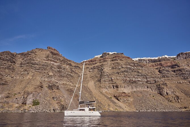 Santorini Oia: Caldera Luxury Sunset Cruise With BBQ & Drinks - Unlimited Local Drinks and Beverages