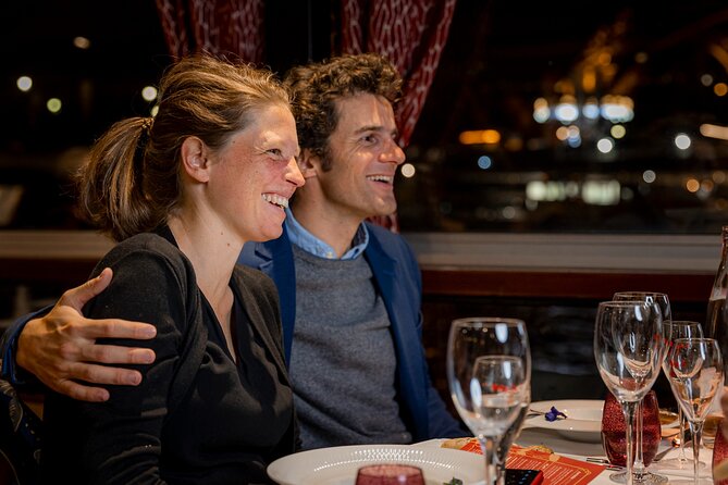 Seine River Dinner Cruise Maxims De Paris With Champagne and Live Music - Ambiance and Atmosphere