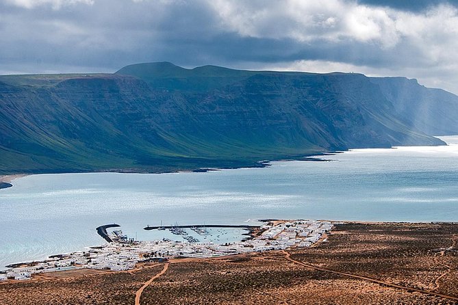 Walking Tour Through La Corona Volcano and Famara Cliff - Meeting Point and Pickup Options