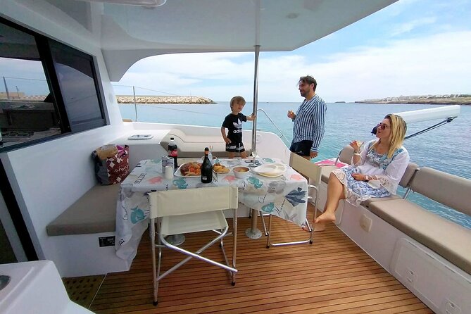 Guided Tour by Catamaran with Aperitif from Polignano a Mare - The Sum Up